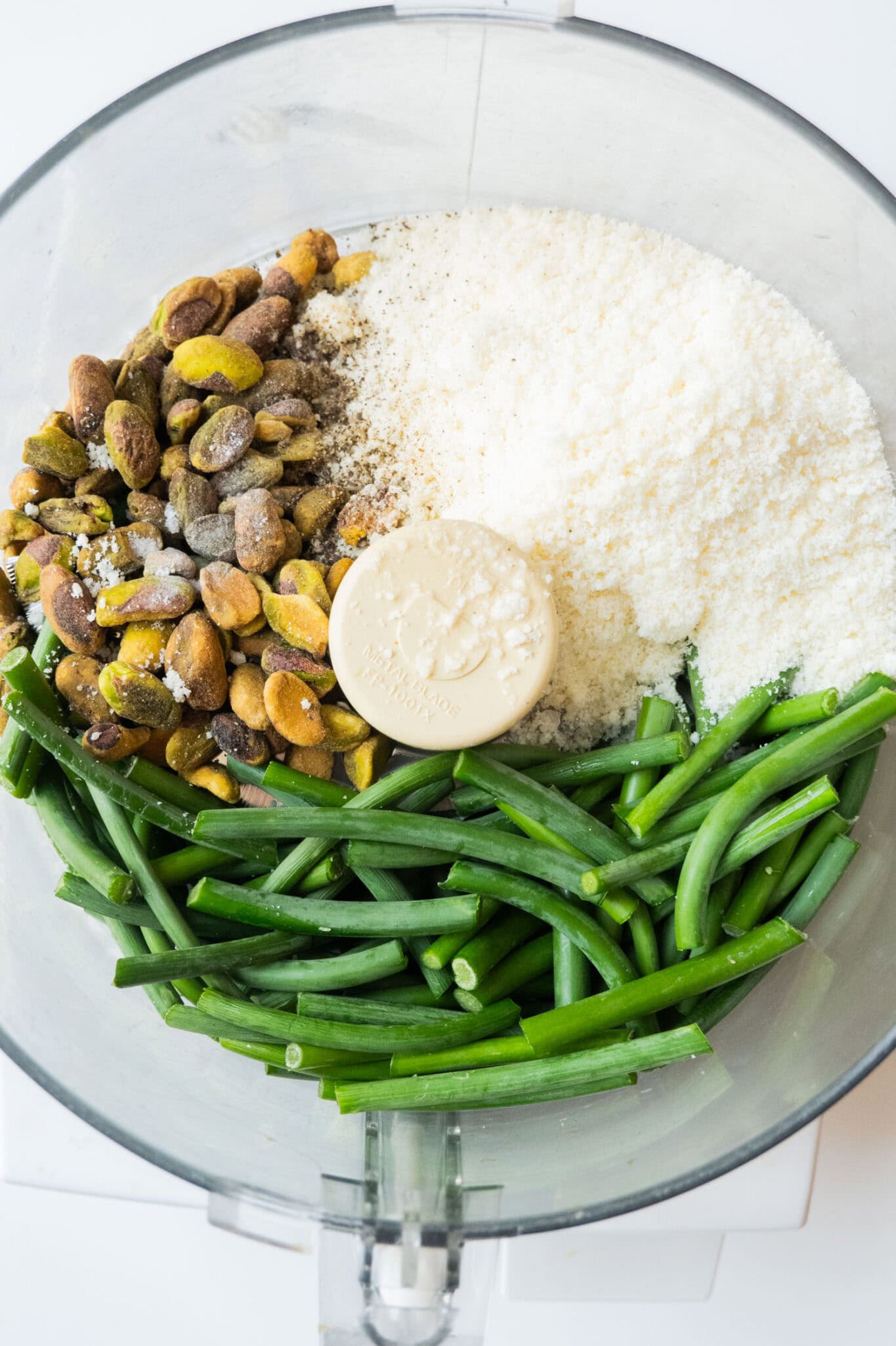 Fresh Garlic Scape Pesto (made with pistachios!) - Brooklyn Farm Girl